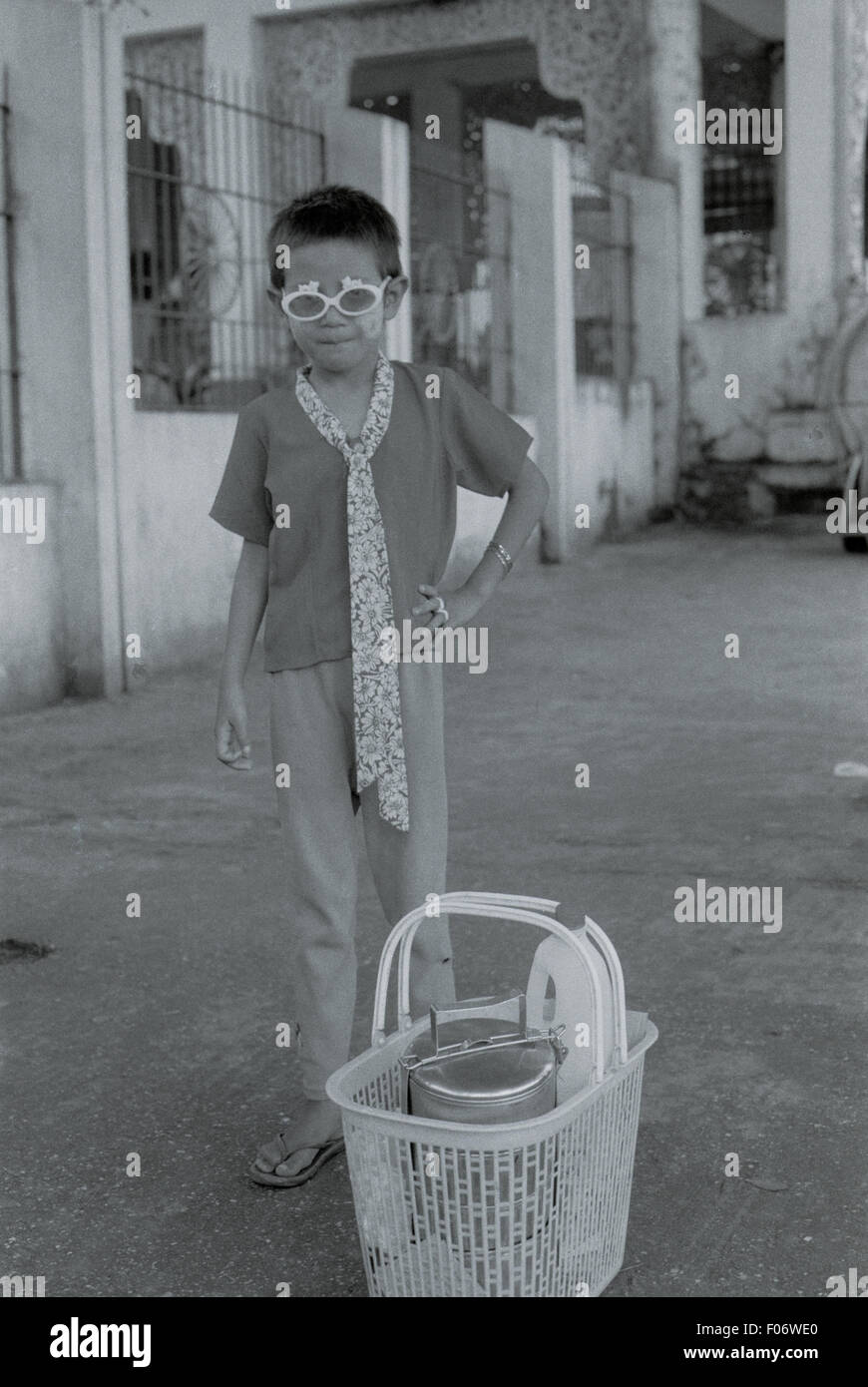 trendy street kid rangoon brian mcguire Stock Photo - Alamy