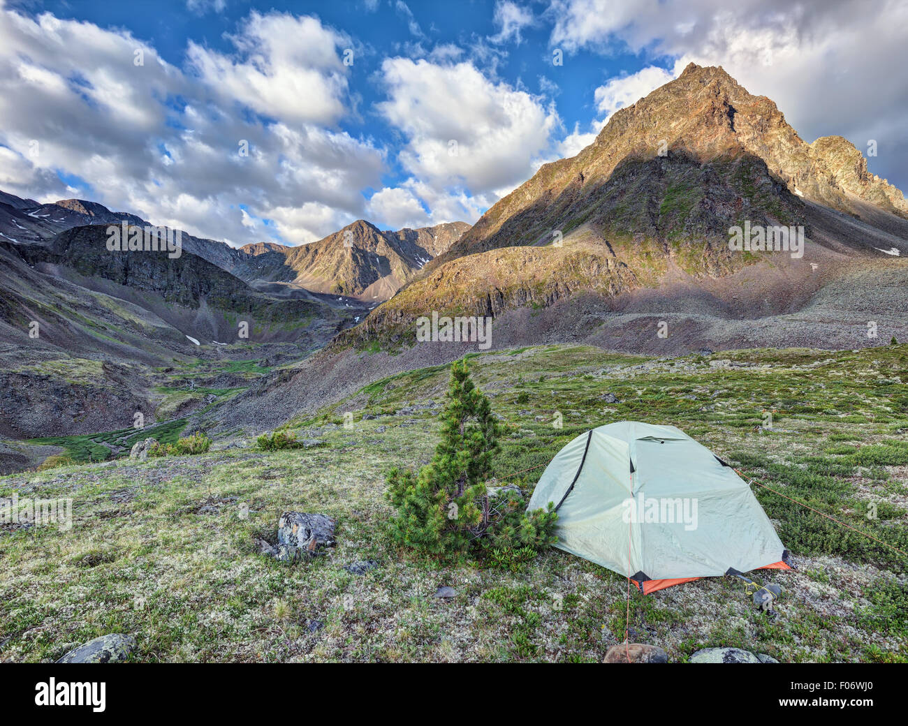 Tourist tent in the mountain tundra of Eastern Siberia. Tunka Alps. The ...
