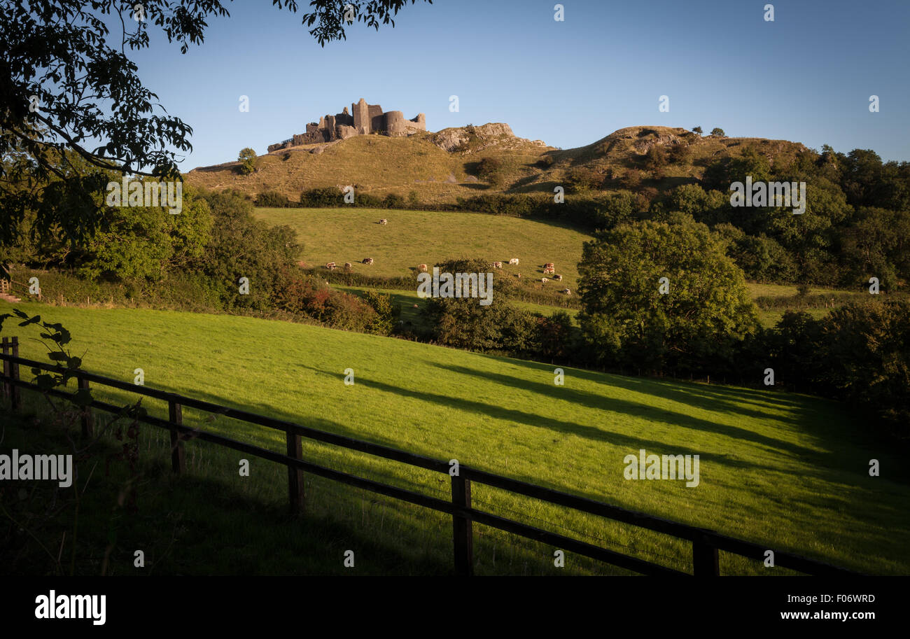 Carreg Cennen castle sits high on a hill near the River Cennen, in the ...