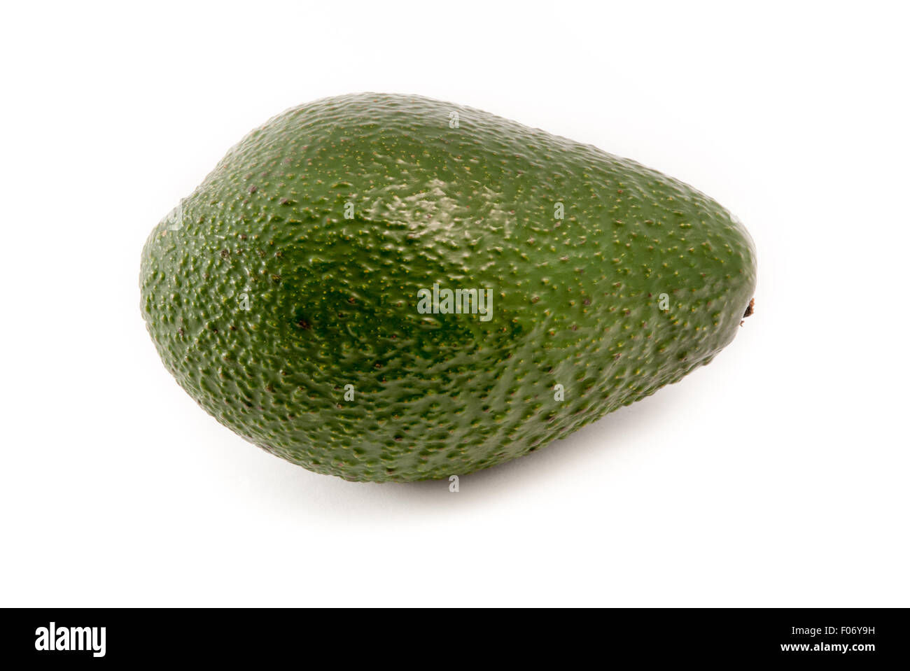 one green avocado isolated on white background Stock Photo - Alamy