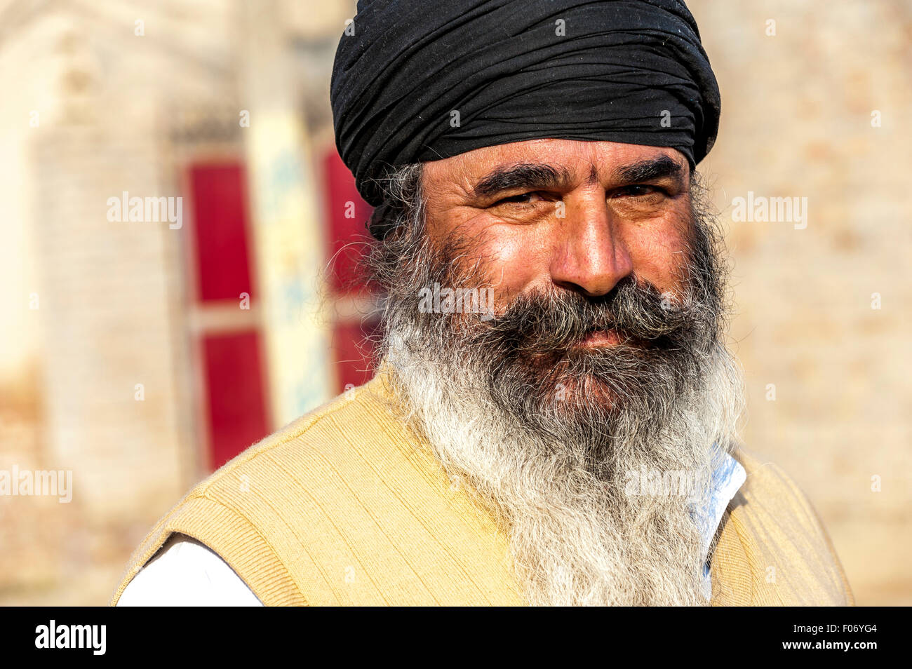 Punjabi man smiling with black turban and a wonderful greying beard ...