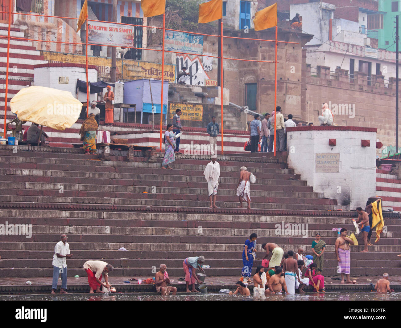 Pilgrims bathing in the morning at Kedar ghat, Varanasi. Devout Hindus ...