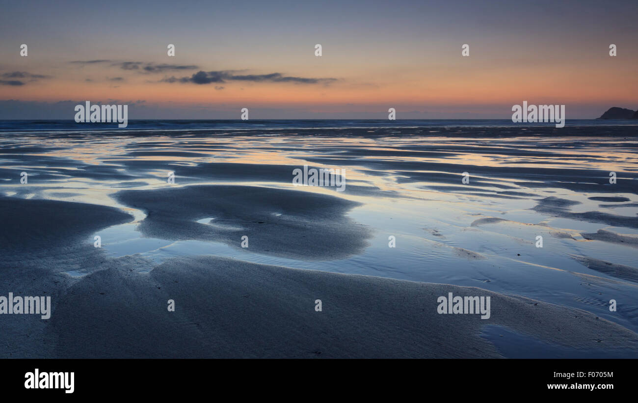 Sunset at low tide on Perran Beach, Perranporth, Cornwall Stock Photo ...