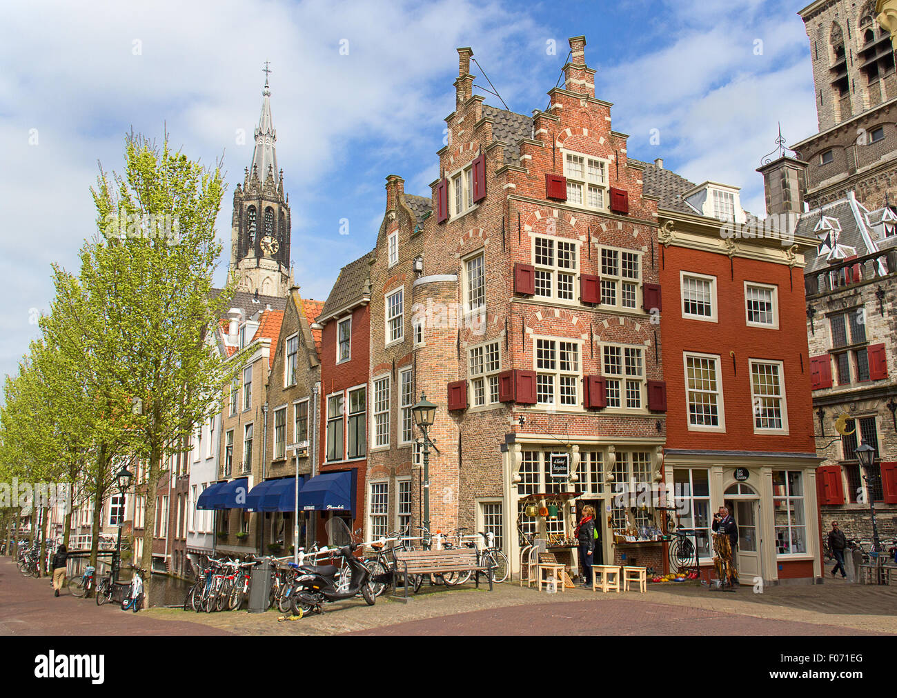 DELFT, NETHERLANDS - MAY 13: People walk near the New Church on May 13 ...