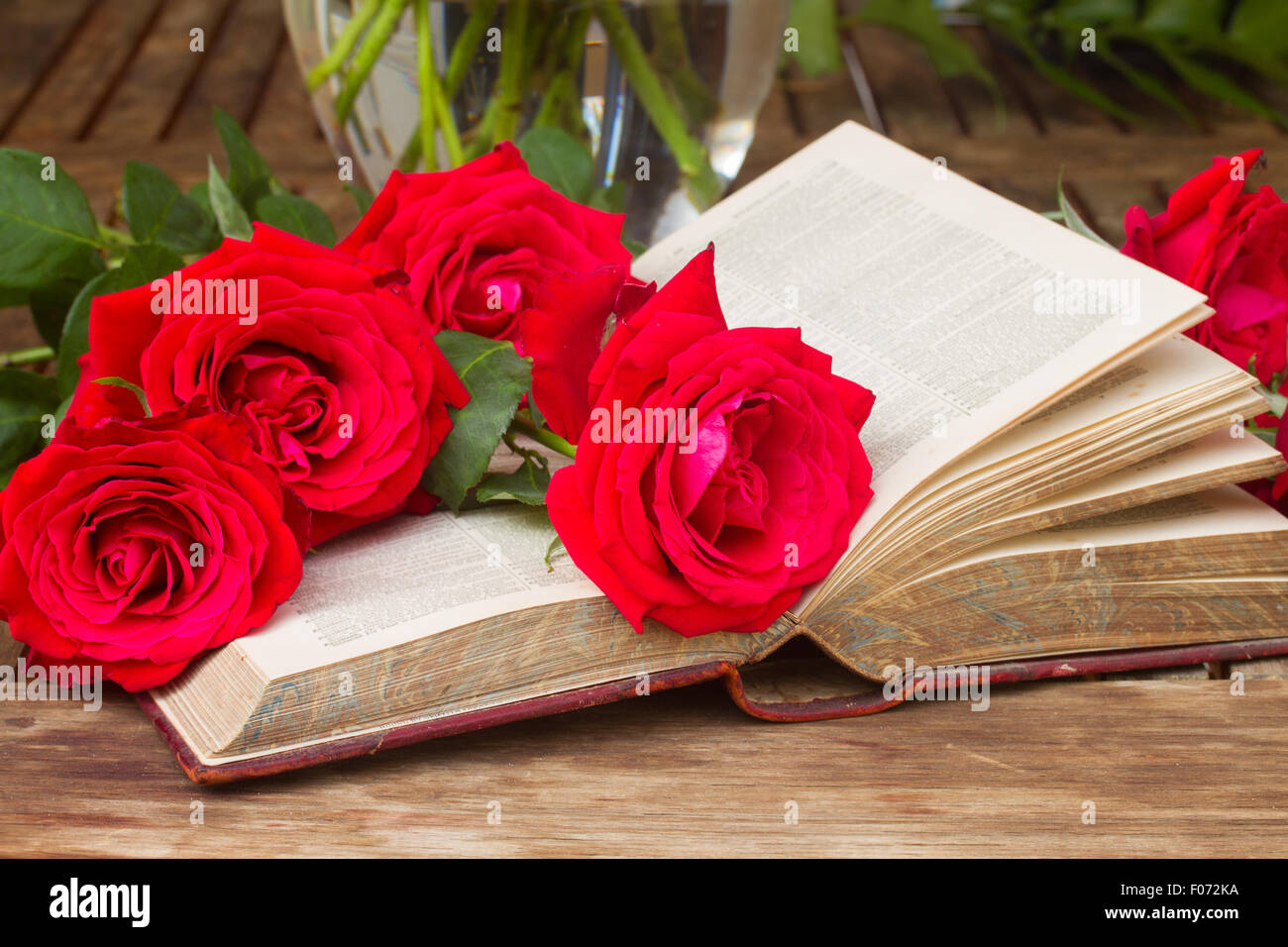 old book with roses Stock Photo - Alamy