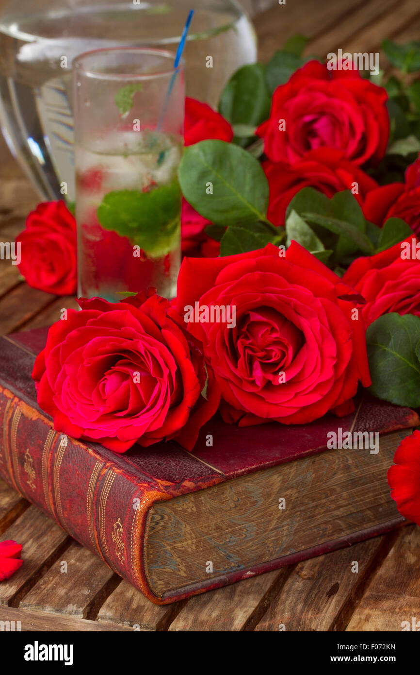 old book with roses Stock Photo - Alamy