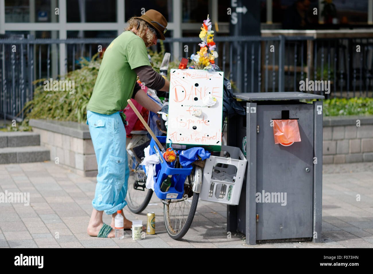 Homeless hippie and bottle collector 'Mike' collects bottles with ...