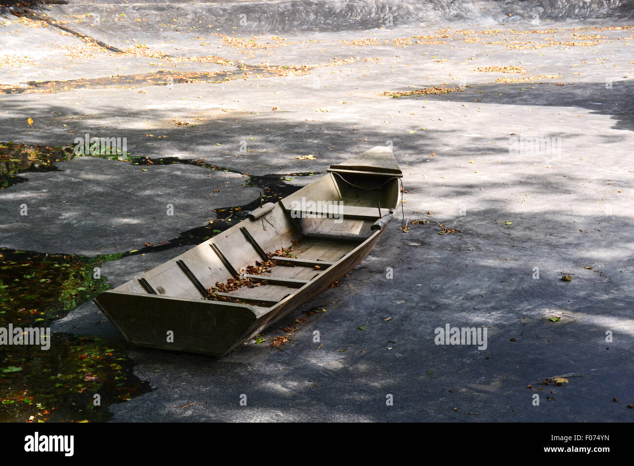 Lonely small boat anchor in hi-res stock photography and images - Alamy
