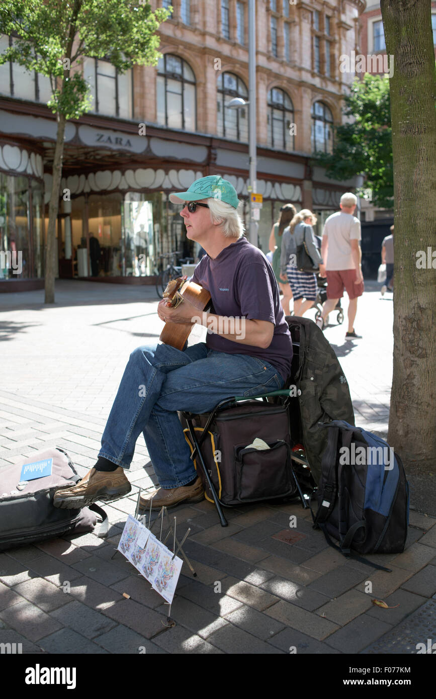Sitting busking singing hi-res stock photography and images - Alamy