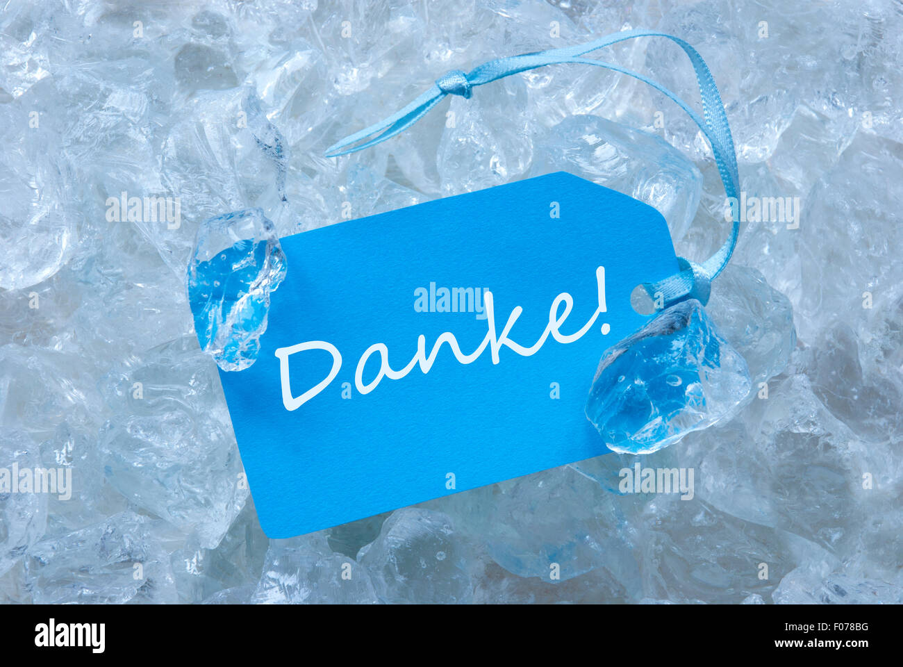 Blue Label On Ice With Danke Means Thank You Stock Photo - Alamy