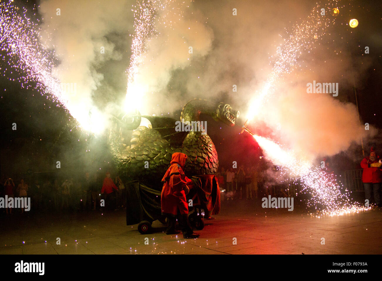 Fire-devils (correfoc) in traditional celebration in Raval neighborhood ...