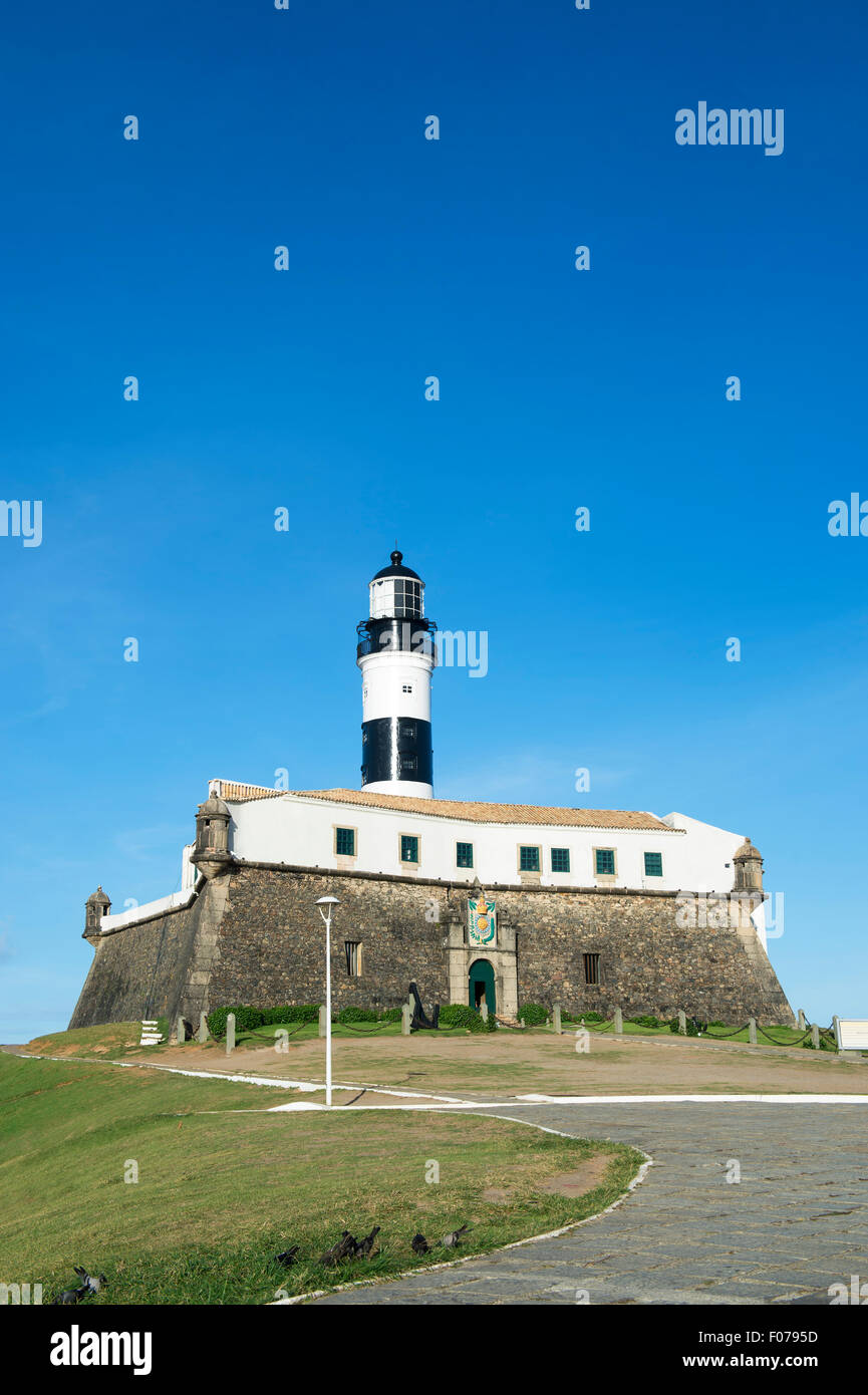 Portrait of the Farol da Barra lighthouse under clear blue sky in ...
