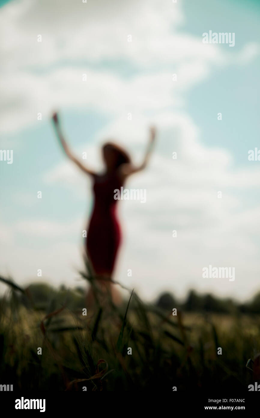 Blurred Female Figure in Park Stock Photo - Alamy