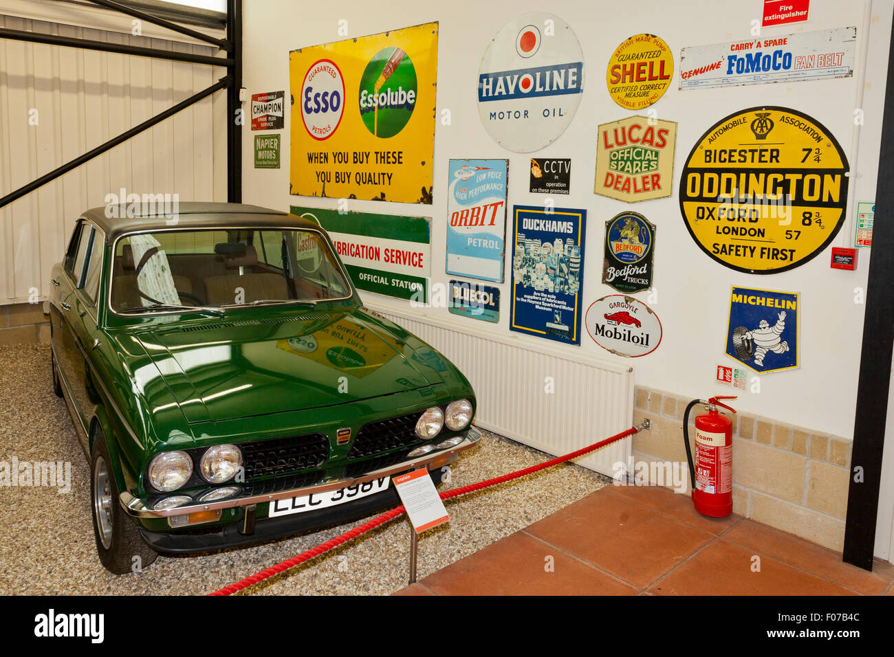 A 1978 Triumph Dolomite and vintage motoring signs in the Haynes ...