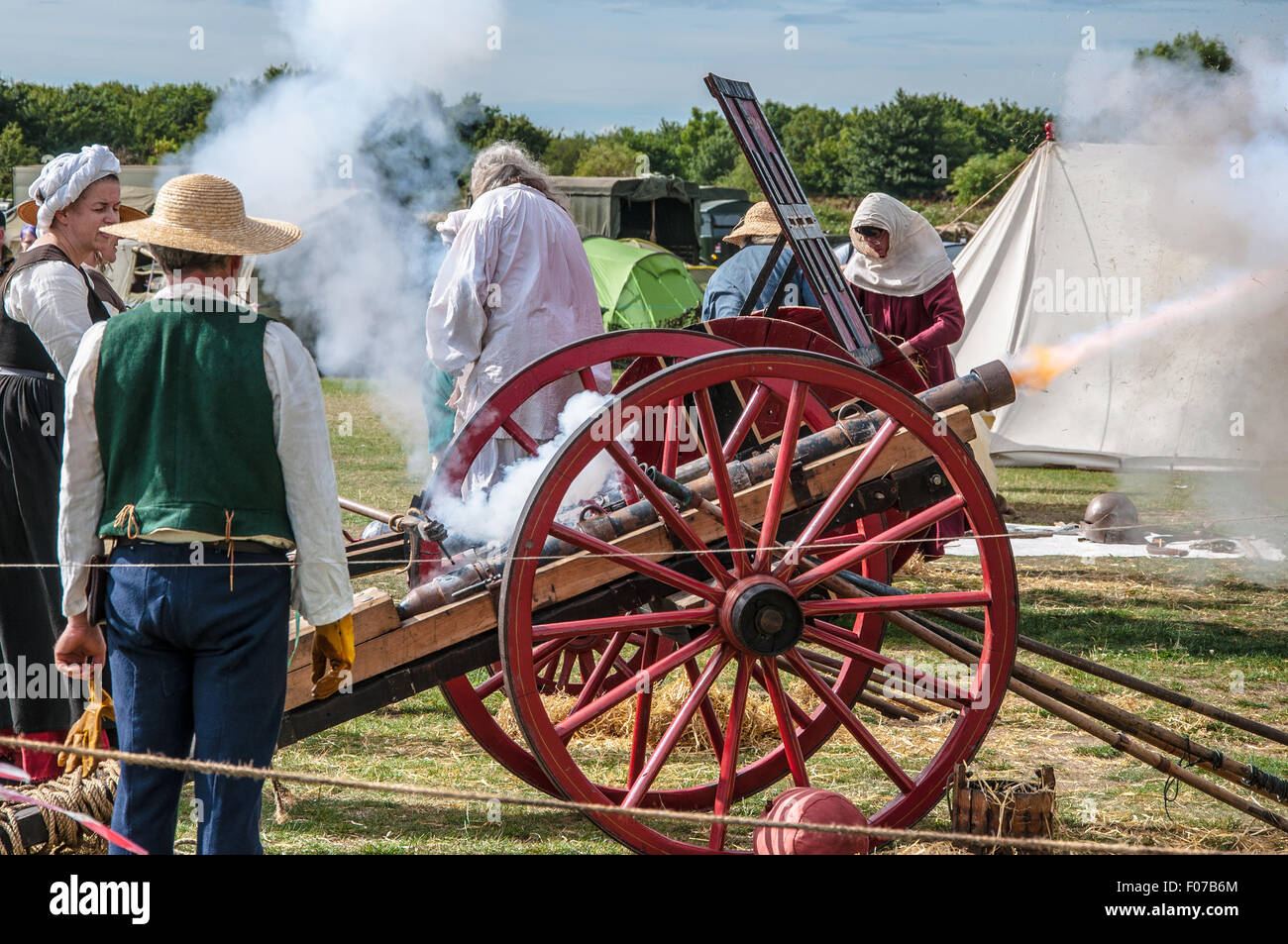 Military re-enactment early cannon gunfire. Vintage historic weapon ...