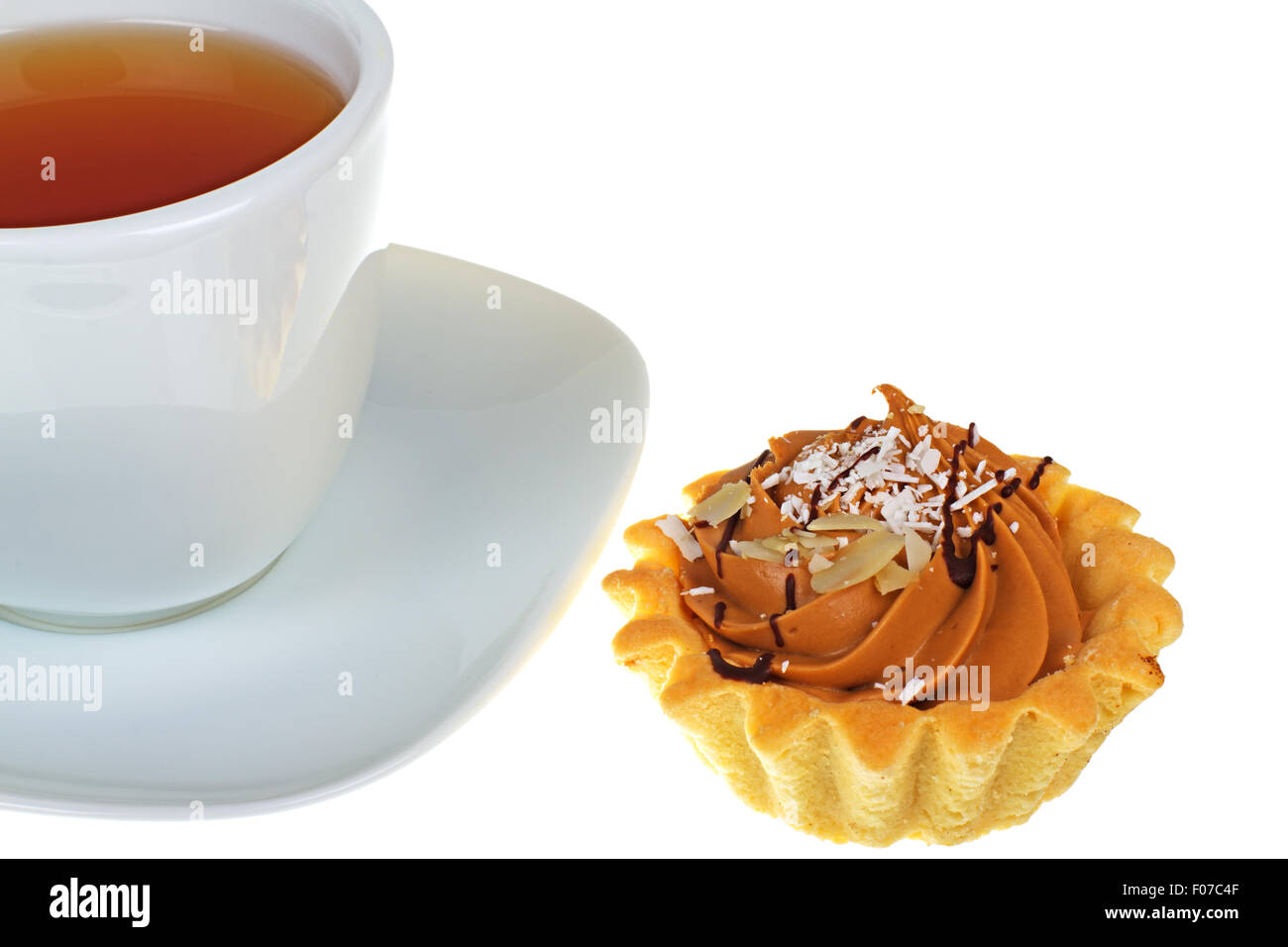 the cup of tea and cake isolated on white background Stock Photo - Alamy