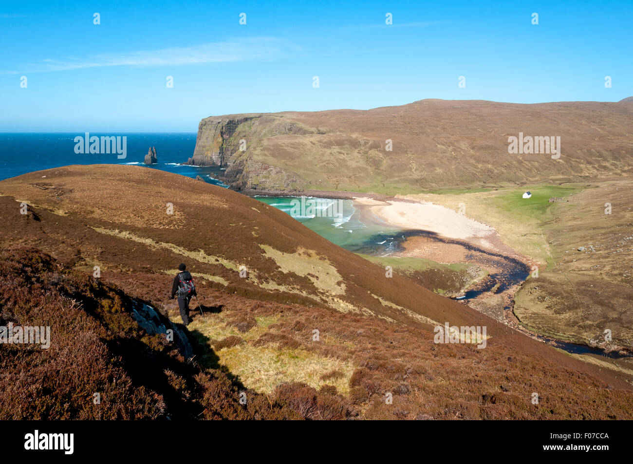 A walker approaching Kearvaig Bay, on the north coast east of Cape ...