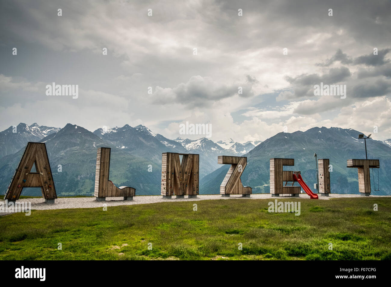 Images in and around the Tyrolean village of Soelden Almzeit sign above ...
