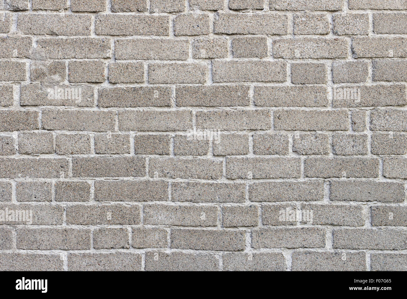 Grey brick wall texture background Stock Photo - Alamy