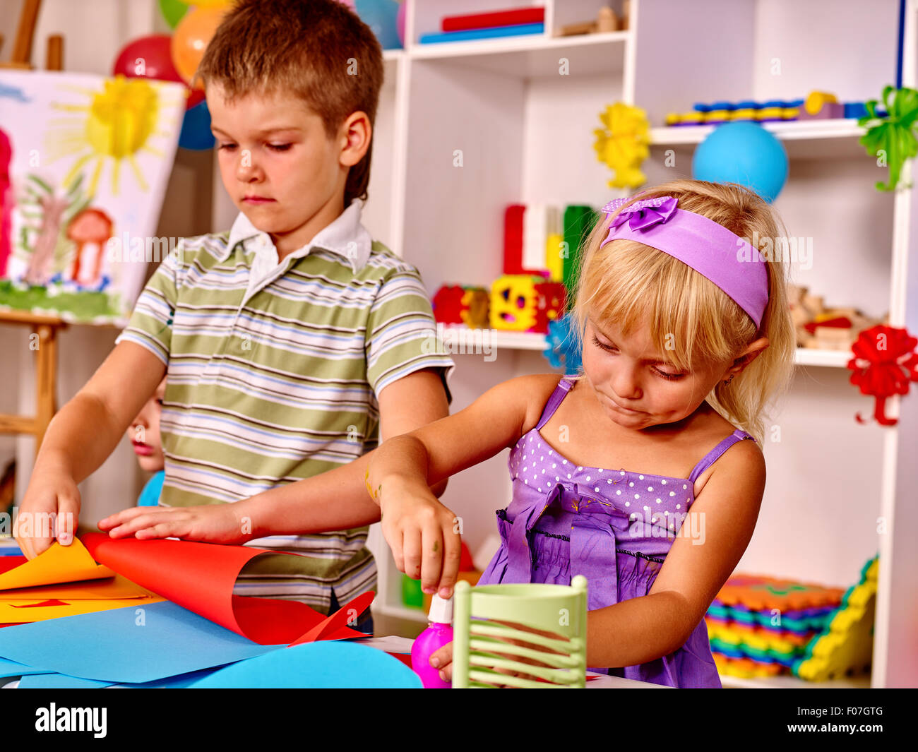 Child cutting out scissors paper Stock Photo - Alamy