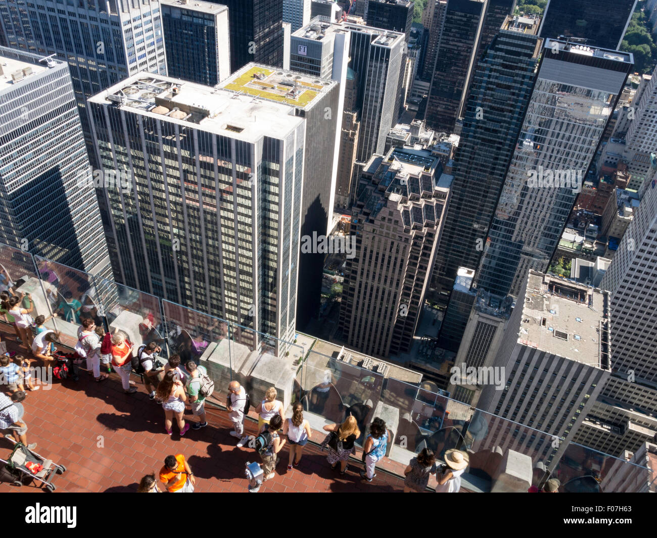 Tourists at Top of the Rock Observation Deck, Rockefeller Center, NYC ...