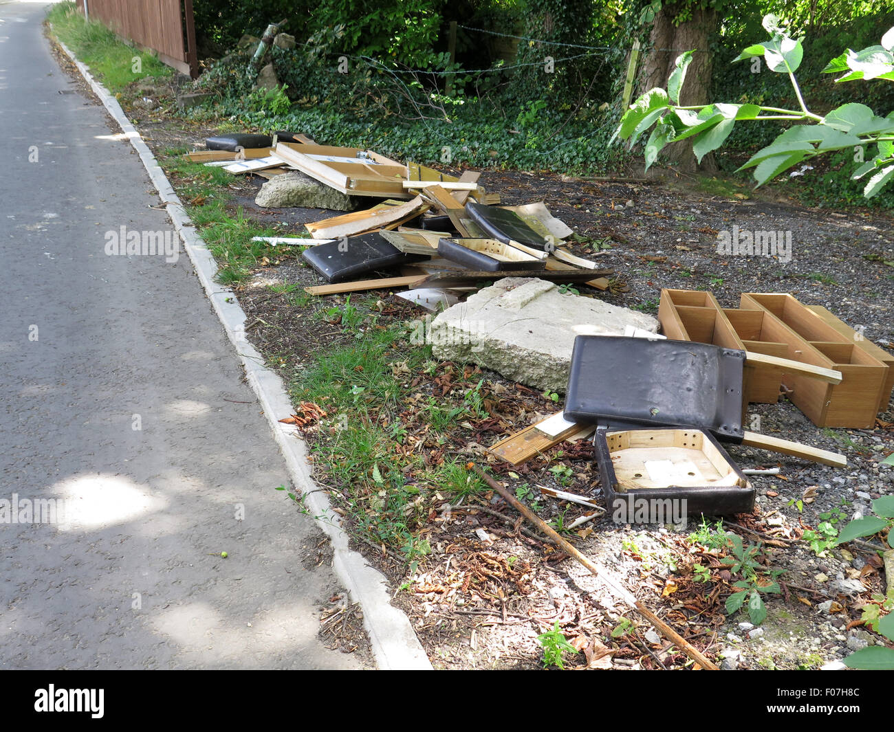 Fly Tipped Rubbish At Roadside Stock Photo Alamy