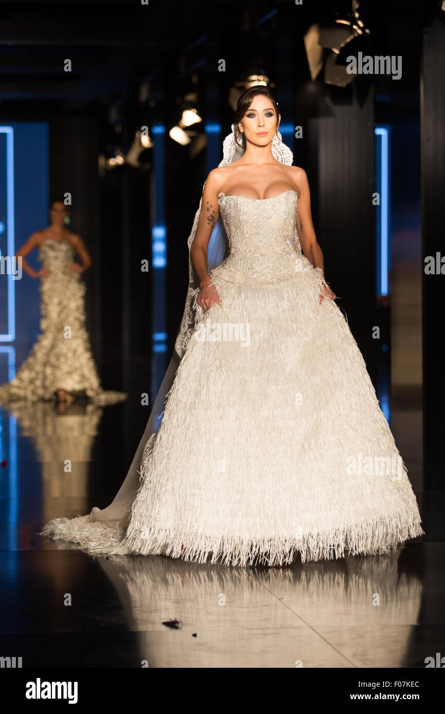 ISTANBUL, TURKEY - NOVEMBER 21, 2014: A model showcases one of the ...