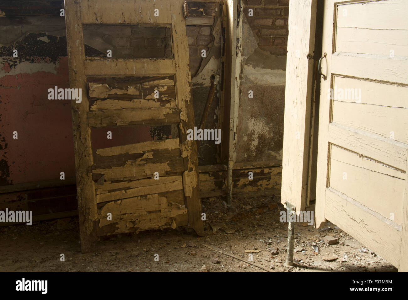 Old wooden doors in abandoned room Stock Photo - Alamy