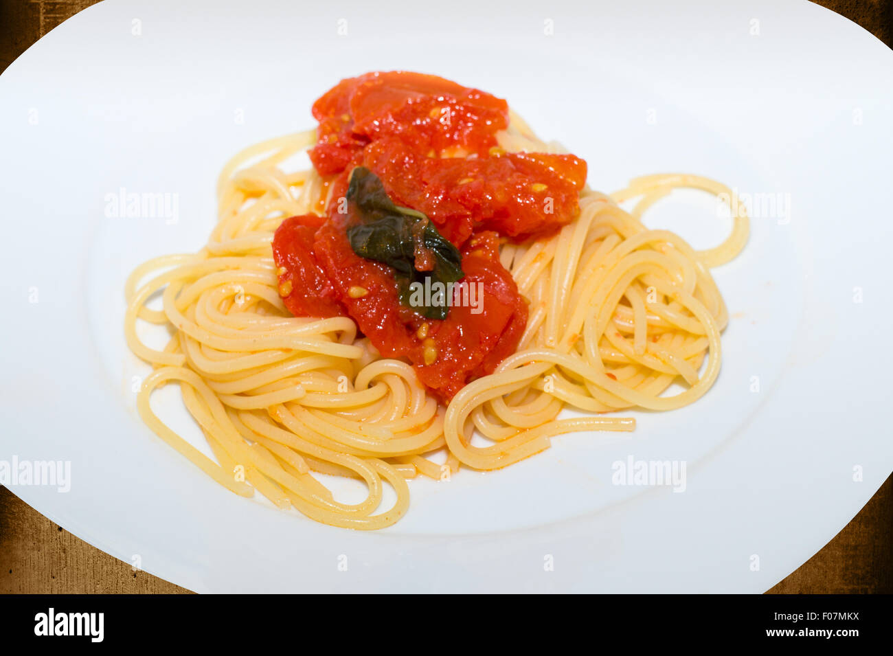 Italian Spaghetti in a pot on table Stock Photo - Alamy