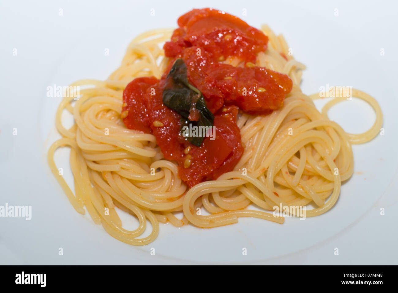 Italian Spaghetti in a pot on table Stock Photo - Alamy