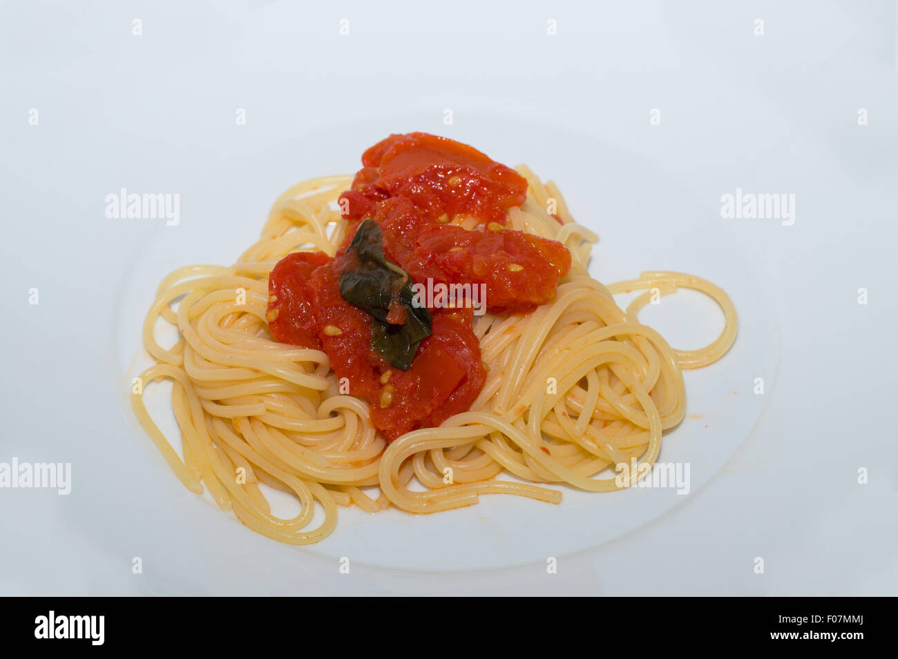 Italian Spaghetti in a pot on table Stock Photo - Alamy