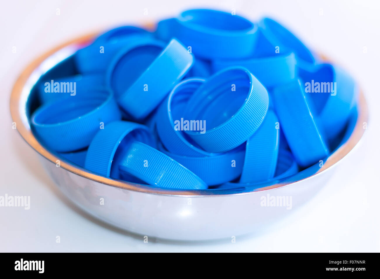 One stack of bottle caps, isolated on white background Stock Photo - Alamy
