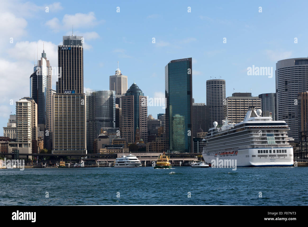 Waterfront buildings, ferries and the Oceania cruise ship Marina ...