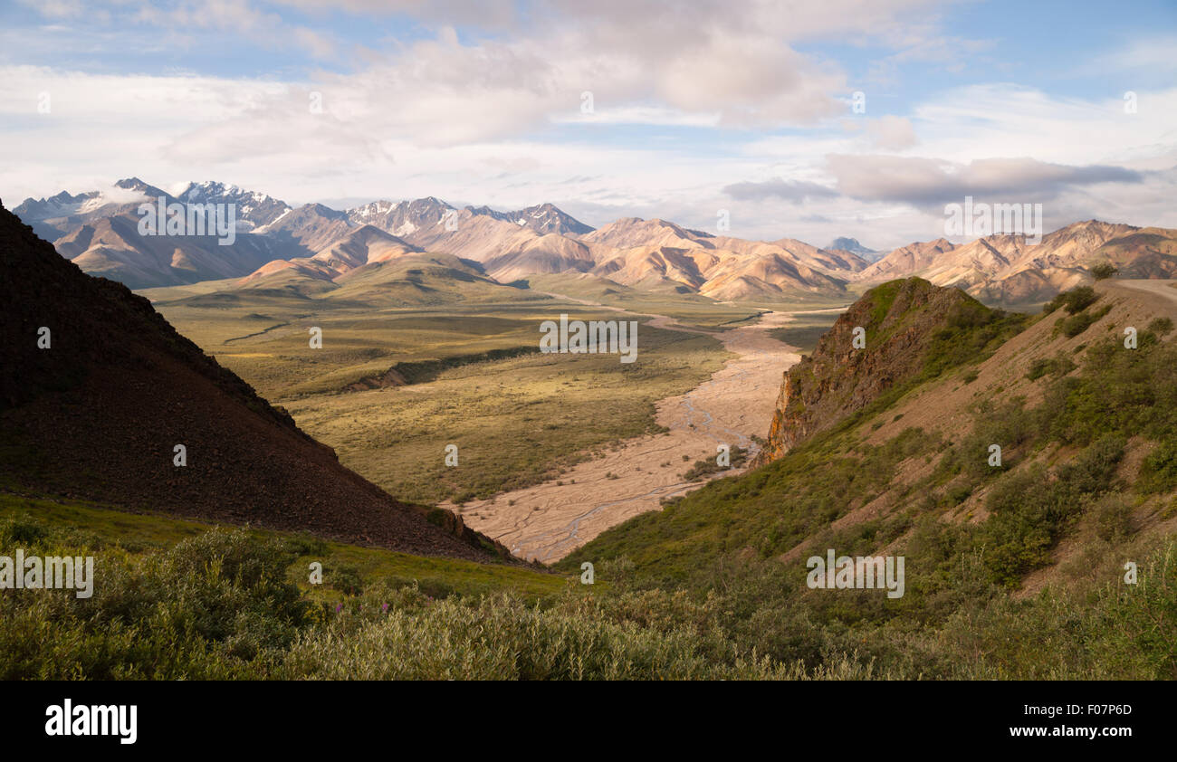 Puffy clouds and blue sky of the Alaska Range in Denali National Park ...