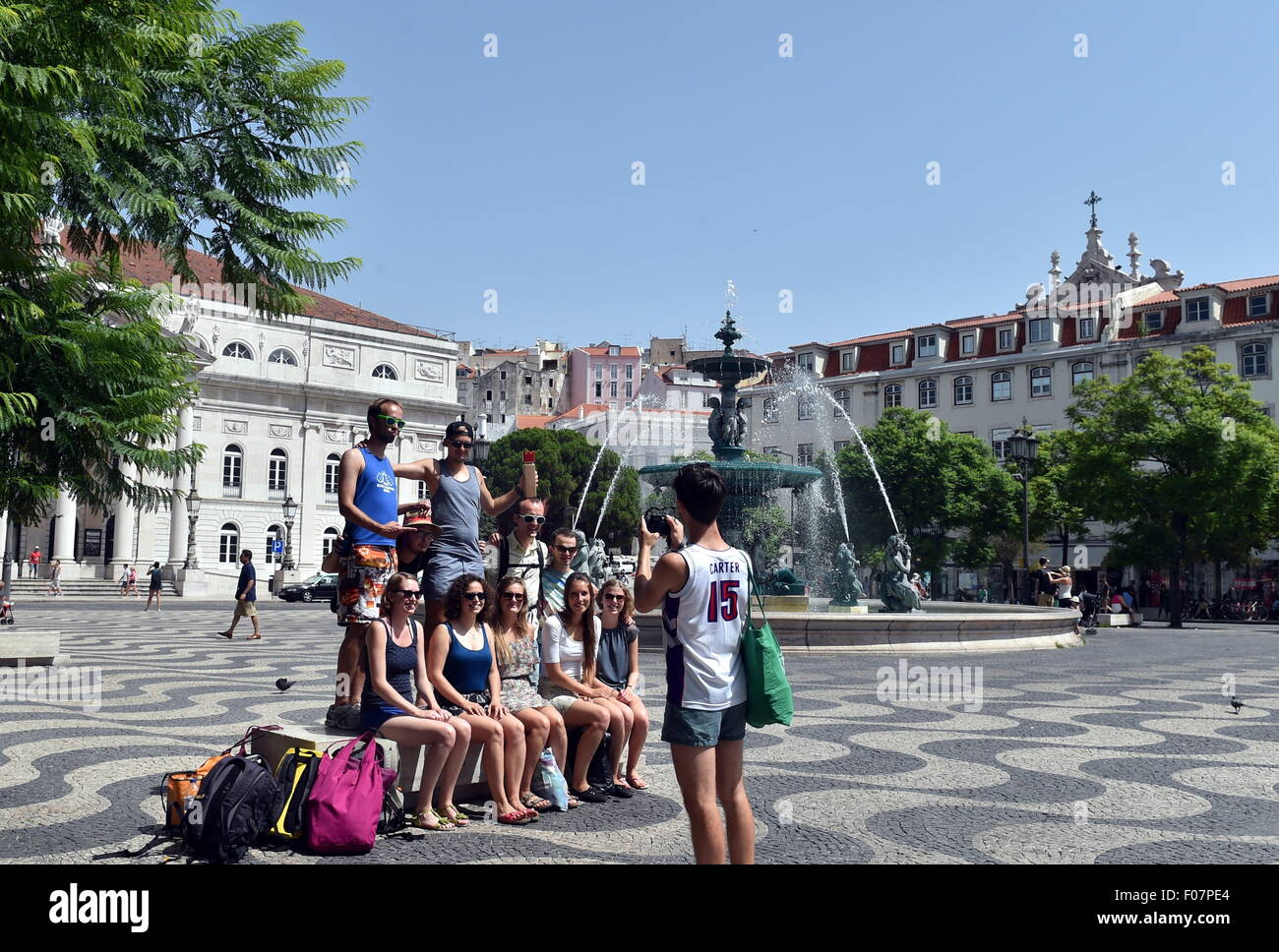 Lisbon. 10th Aug, 2015. A group of German tourists pose for photo at ...