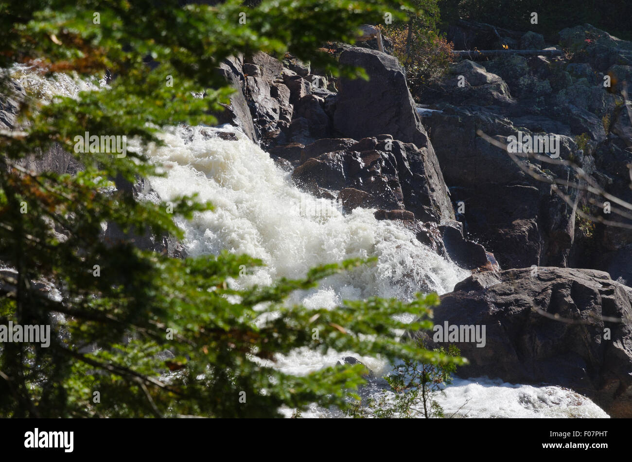 Cascading water over rocks in Superior Lake Provincial park, Canada ...