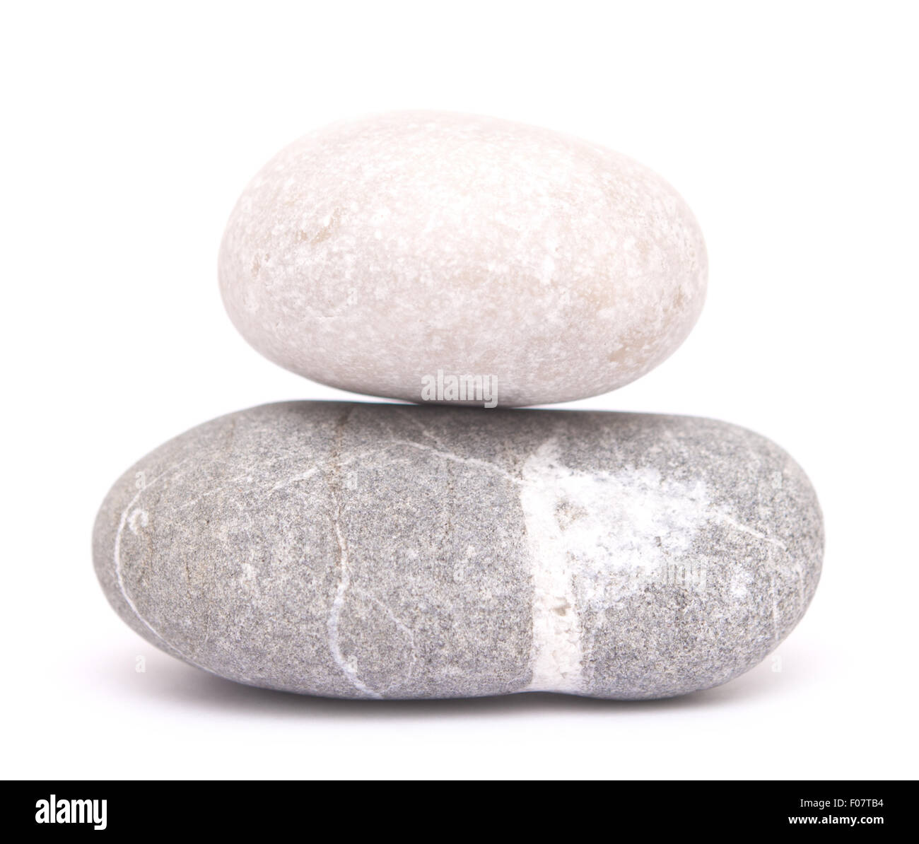 balancing pebbles isolated on white background Stock Photo - Alamy