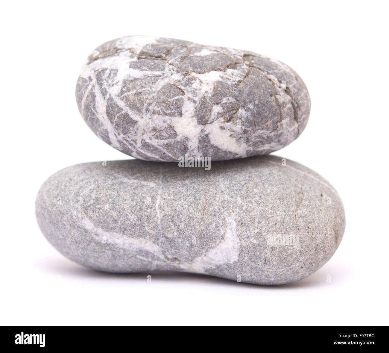 balancing pebbles isolated on white background Stock Photo - Alamy
