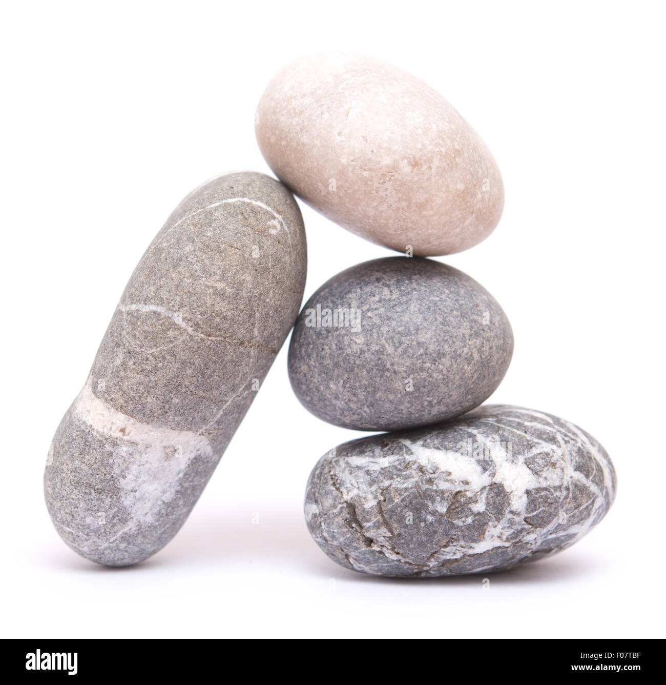 balancing pebbles isolated on white background Stock Photo - Alamy