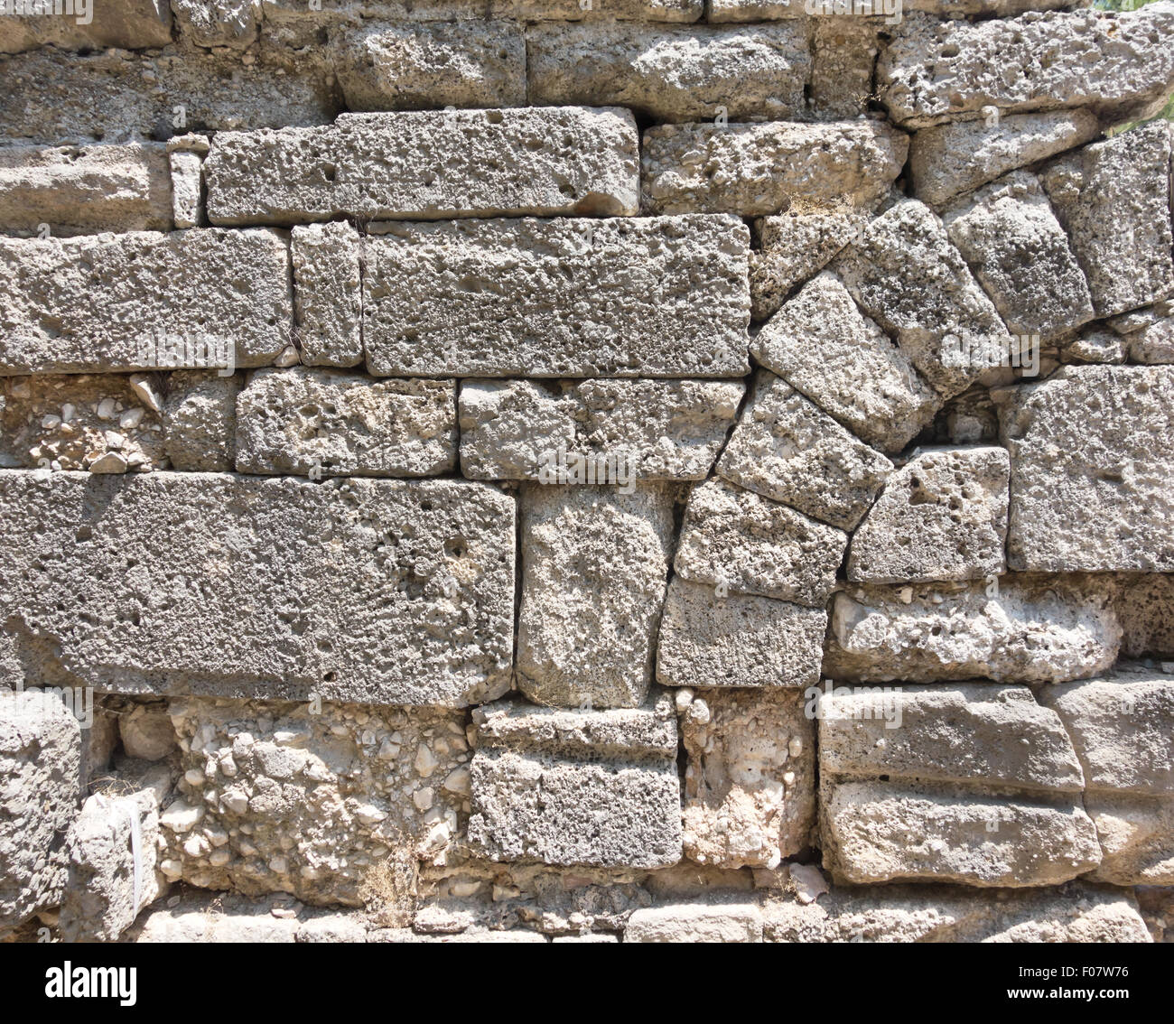 ancient stone wall background Stock Photo - Alamy