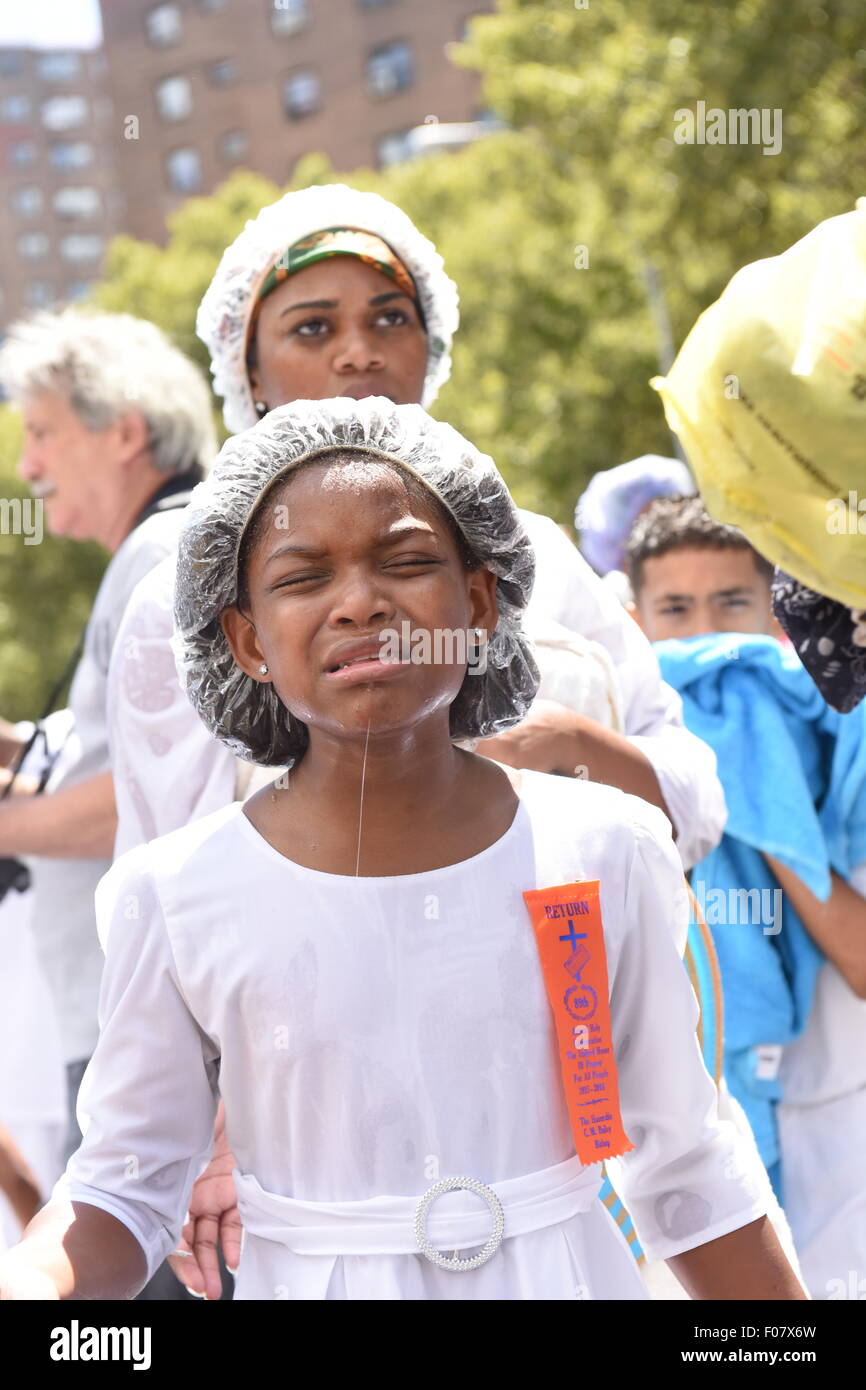 New York City, United States. 09th Aug, 2015. Female congregant reacts ...