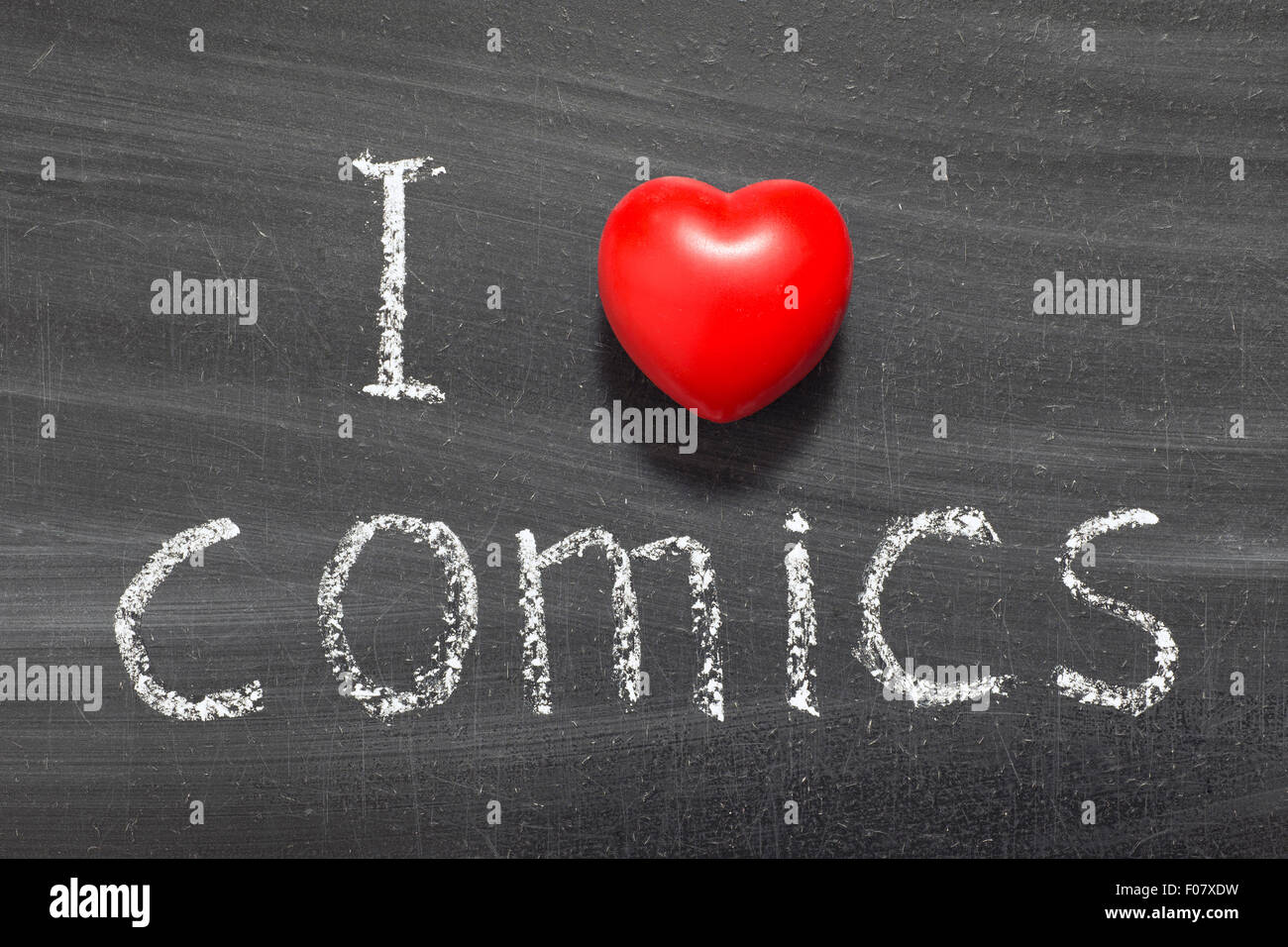 I love comics phrase handwritten on chalkboard with heart symbol ...