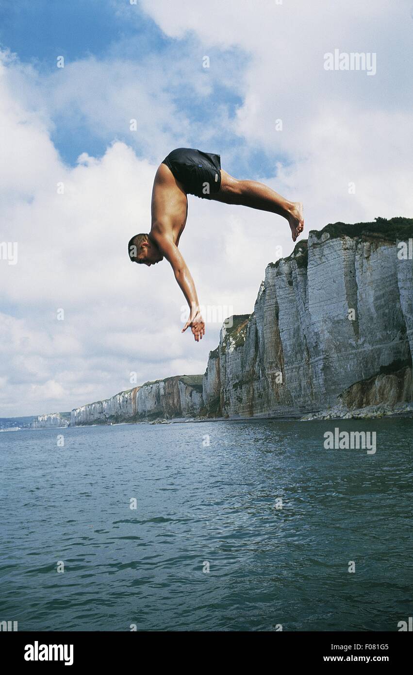 Man diving into Fecamp on the English Channel, France Stock Photo - Alamy