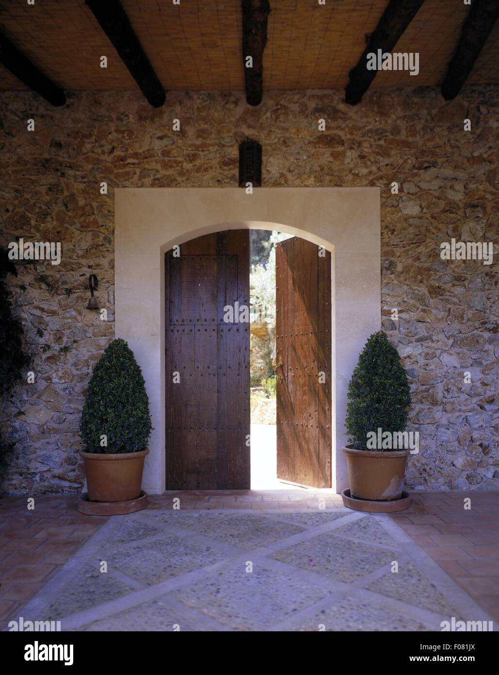 Entrance with wooden gate in Mallorca, Spain Stock Photo - Alamy