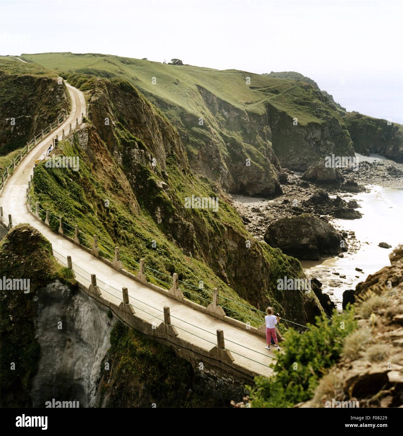 Channel Island of Sark with docks at La Coupee Stock Photo - Alamy