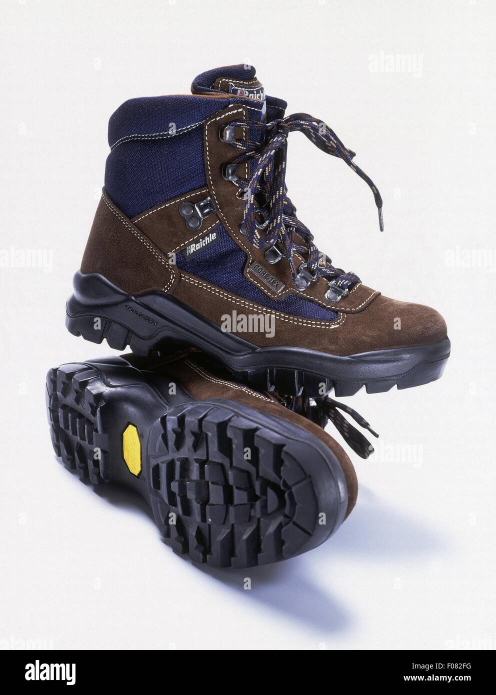 Close-up of hiking boots on white background Stock Photo - Alamy