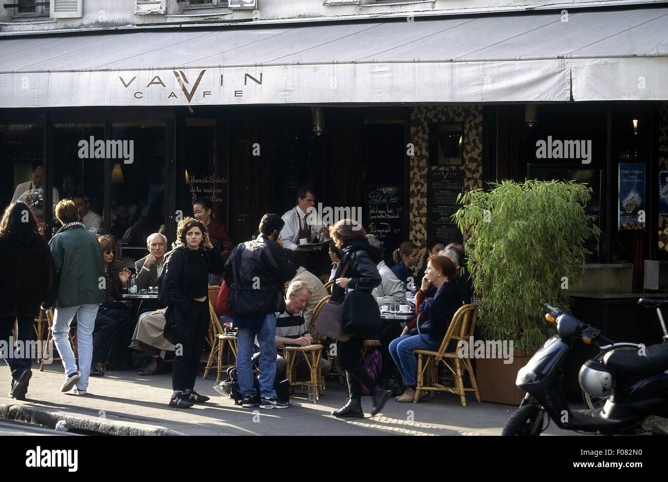 Guests at tables outside Cafe Vavin in Paris, France Stock Photo - Alamy