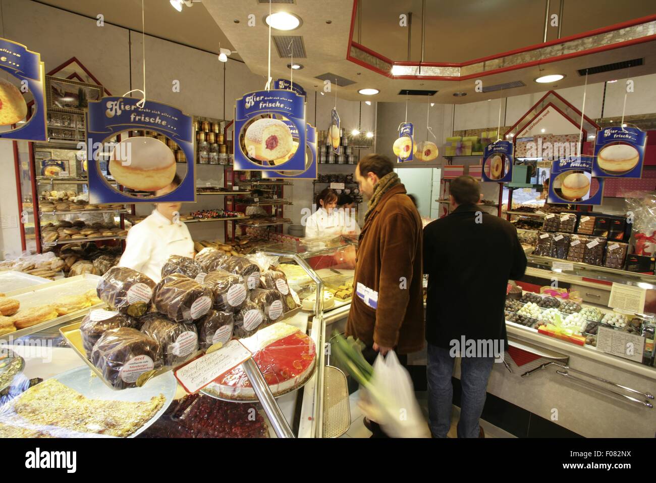 People buying goods in store, Germany Stock Photo - Alamy