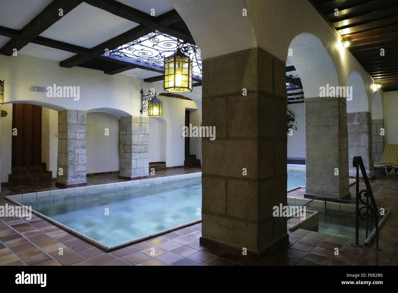 Swimming pool in a restaurant Stock Photo - Alamy
