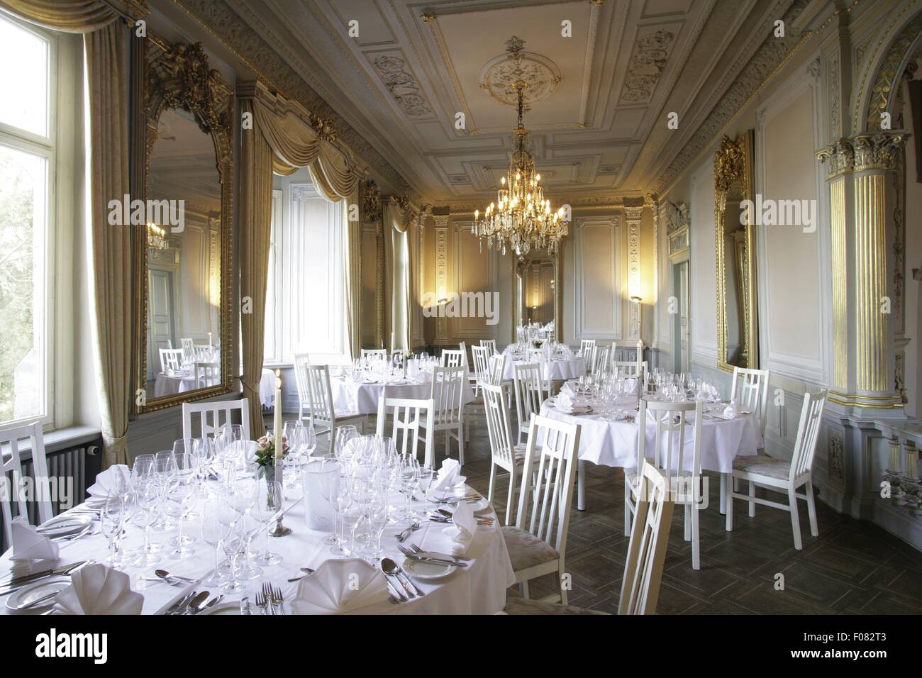 Tables laid in restaurant, Germany Stock Photo - Alamy